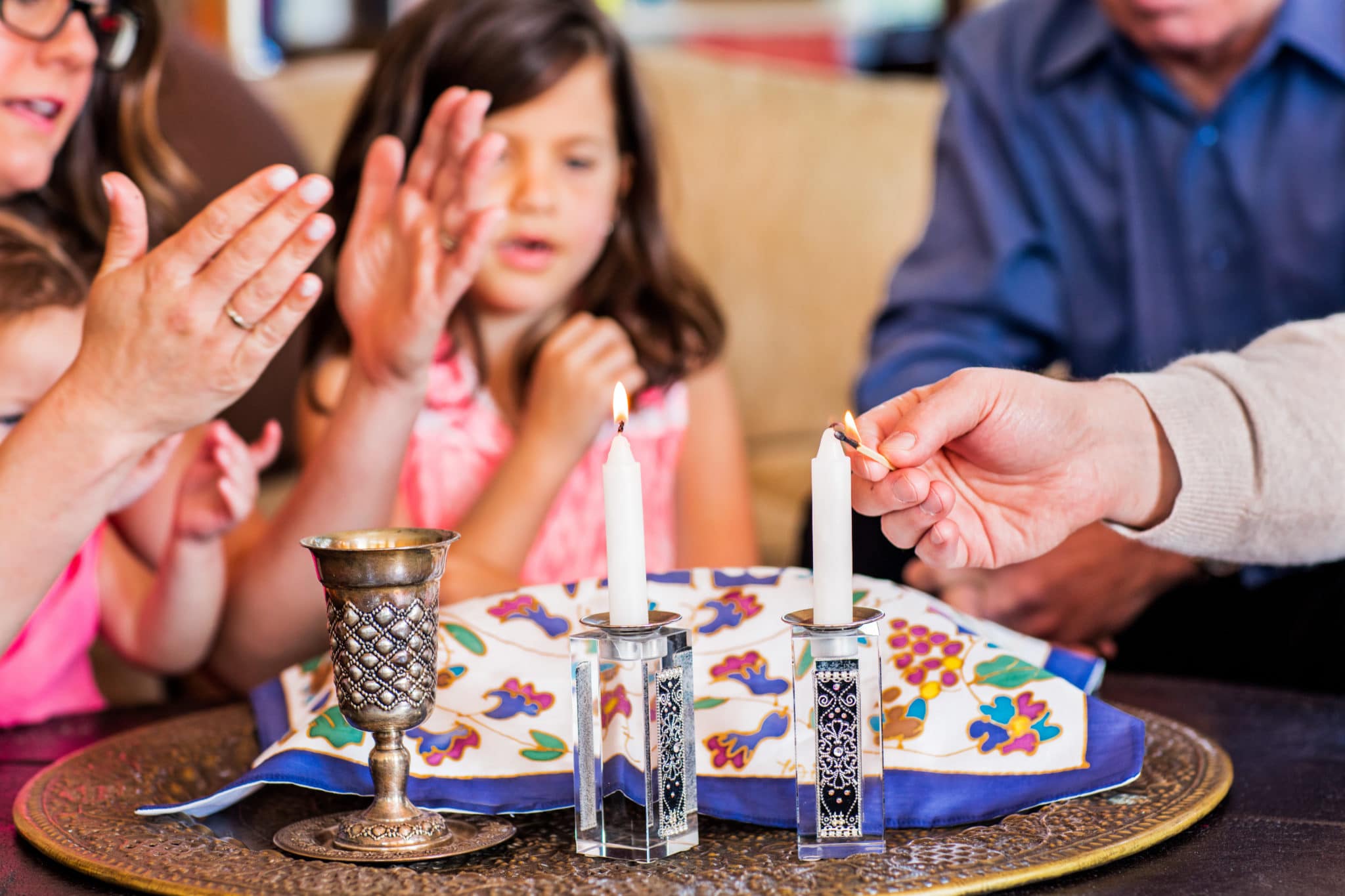 Family Celebrating Shabbat | Jewish Federation of Broward County